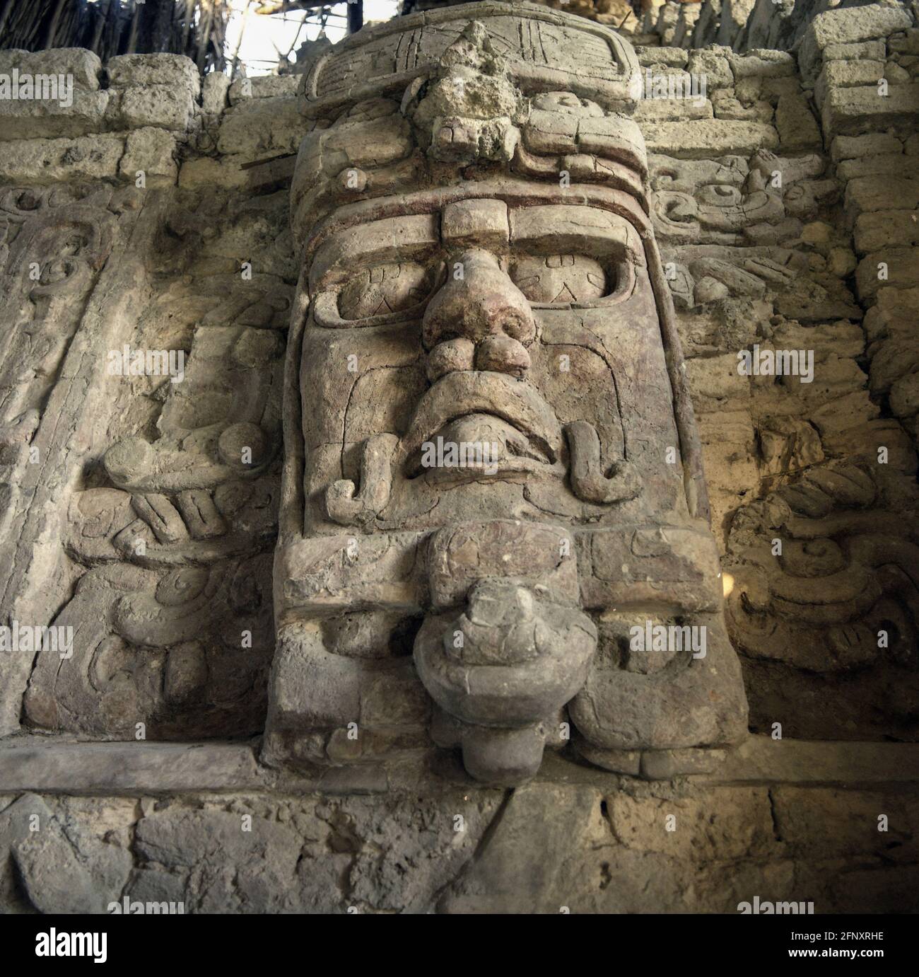 Mayan stucco mask in the archaeological site of Kohunlich Stock Photo ...