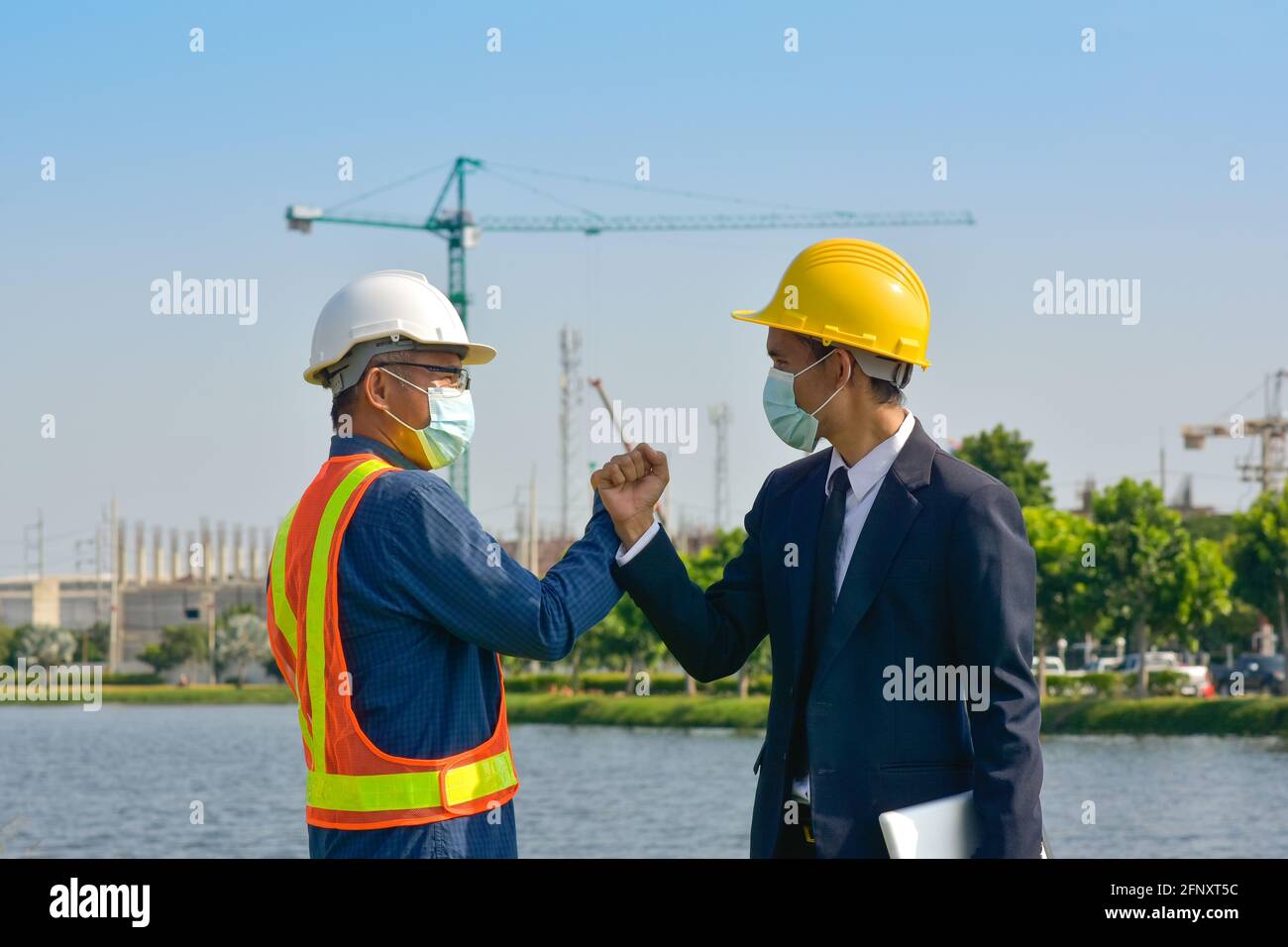 Two people Engineer teamwork outdoor working on site construction Stock ...