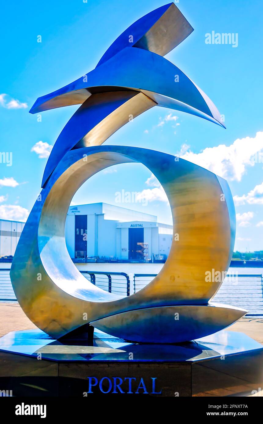 Austal USA Is pictured behind a sculpture, “Portal” by Casey Downing Jr ...