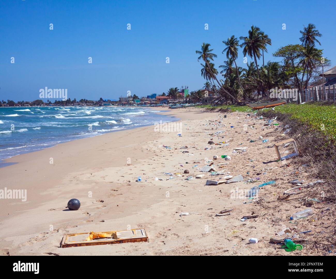 Garbage strewn and washed up on Uppuveli Beach, Trincomalee, Sri Lanka ...