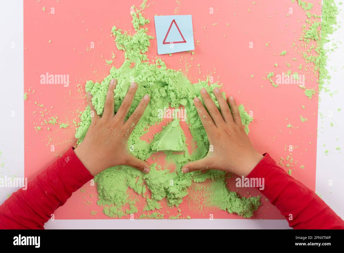 Child writing sand hi-res stock photography and images - Alamy