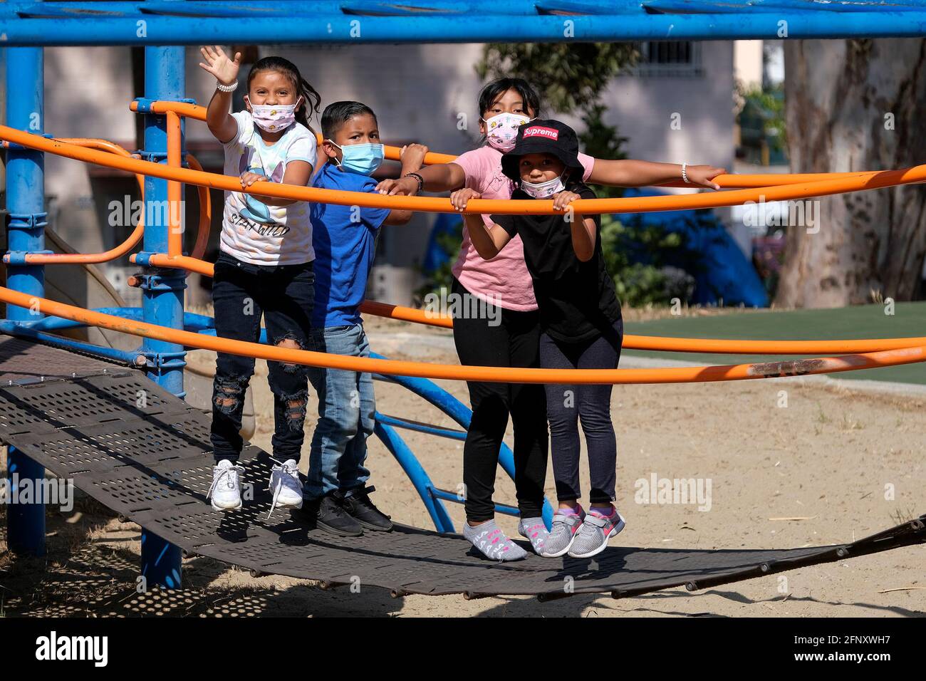 Los Angeles, California, USA. 19th May, 2021. Children wearing face ...