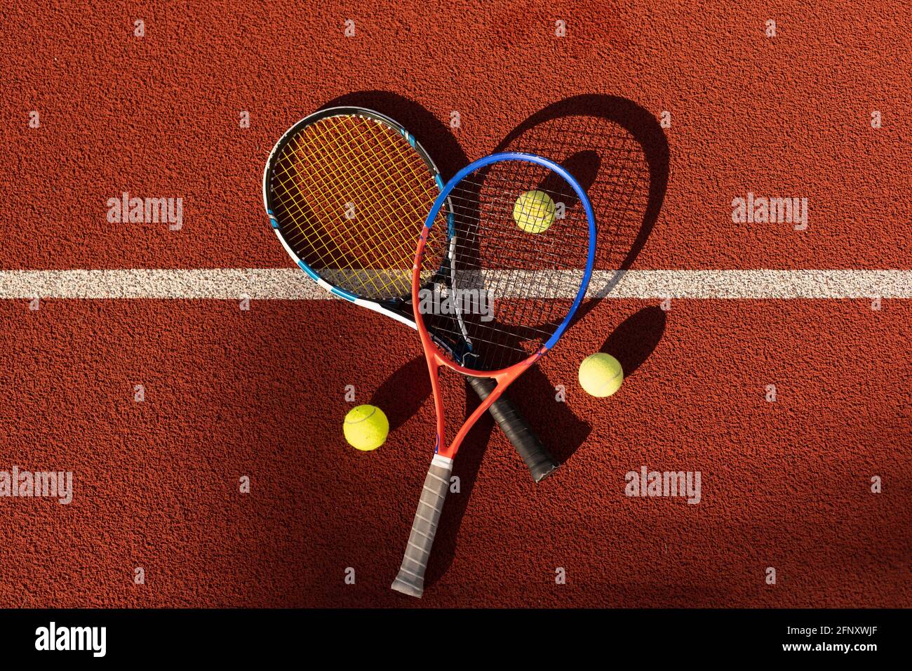 Tennis game. Tennis ball with racket on the tennis court. Sport ...