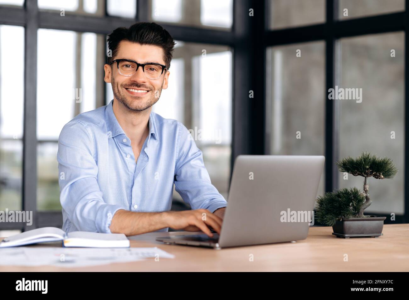 Portrait smiling professional male hi-res stock photography and images ...