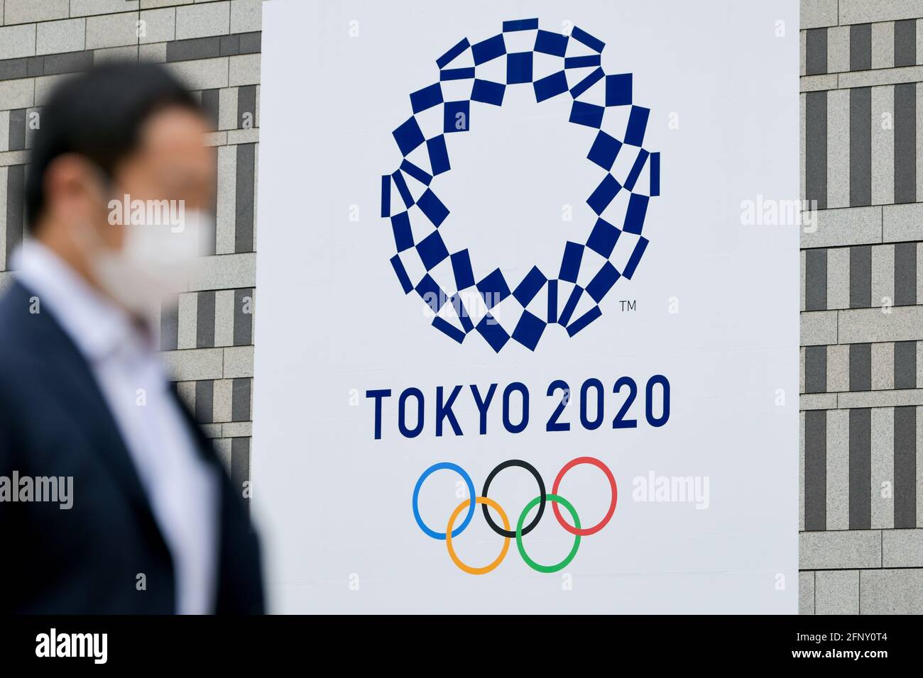 A Tokyo 2020 banner seen on a building in Shinjuku area of Tokyo ...
