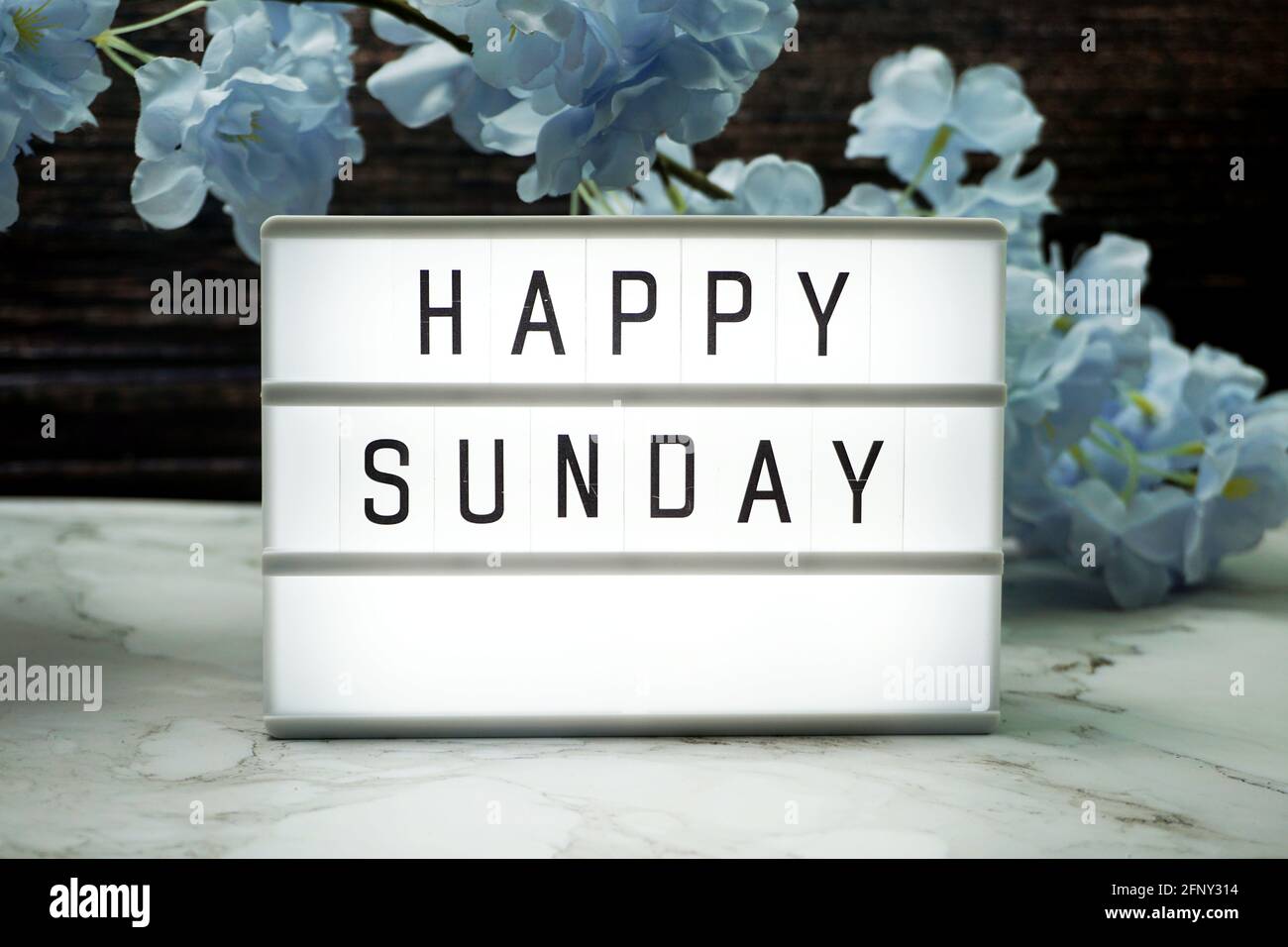 Happy Sunday word in light box with Flowers Decoration Stock Photo - Alamy