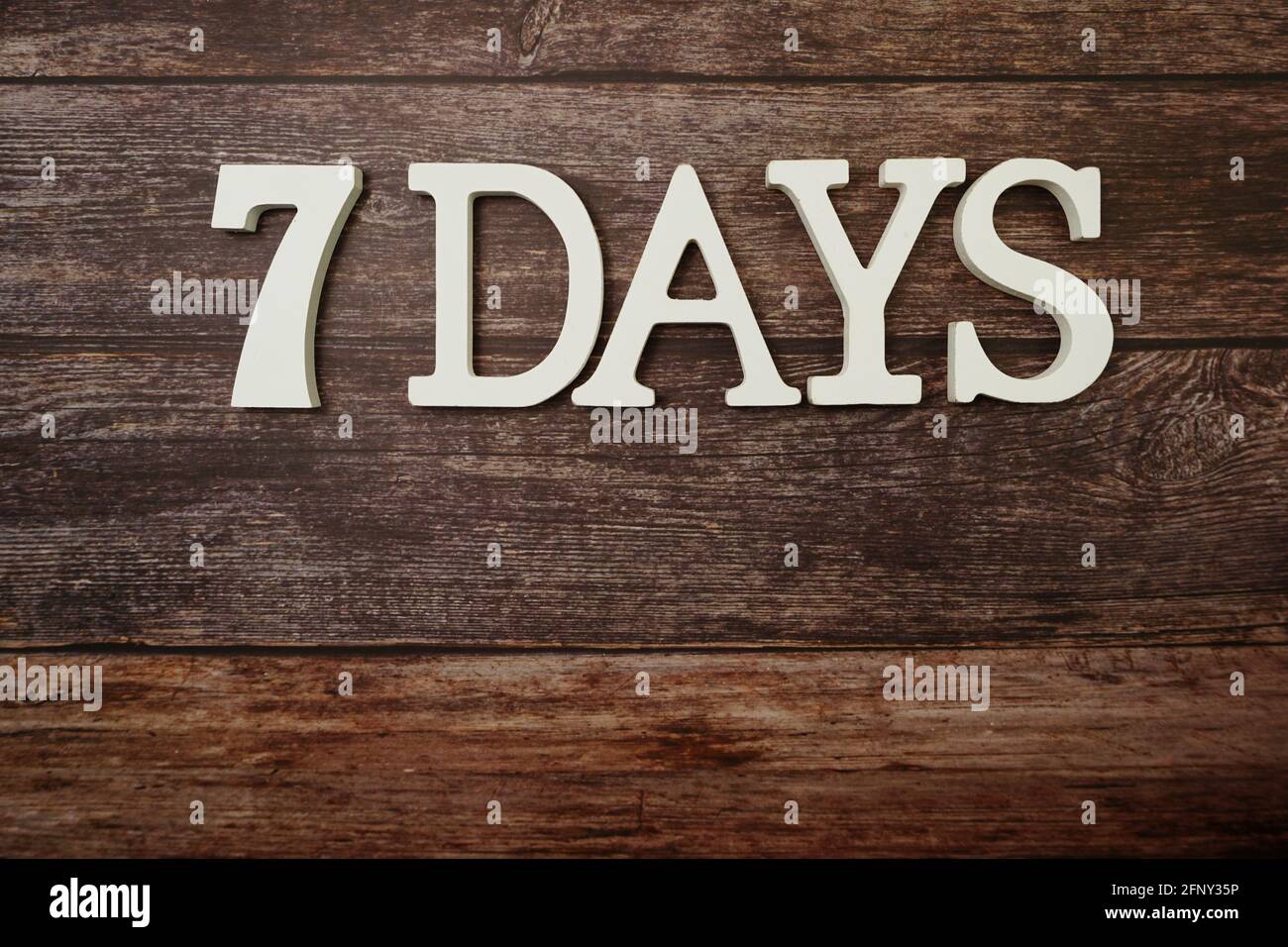 7 Days alphabet letter with space copy on wooden background Stock Photo ...