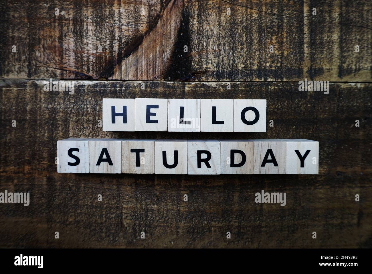 Hello Saturday alphabet letter with space copy on wooden background ...