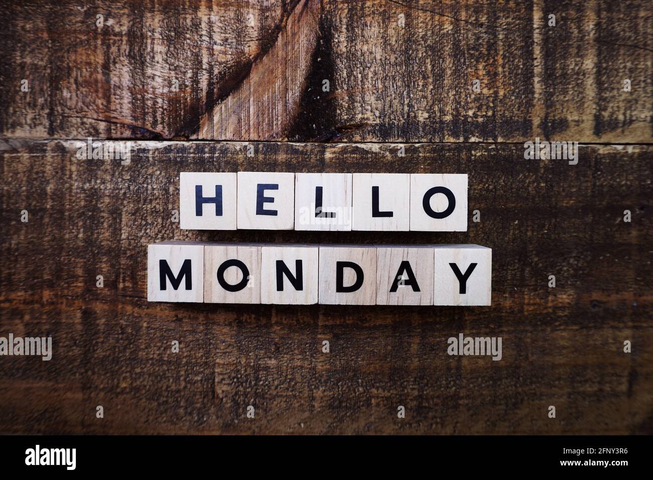 Hello Monday alphabet letters with space copy on wooden background ...