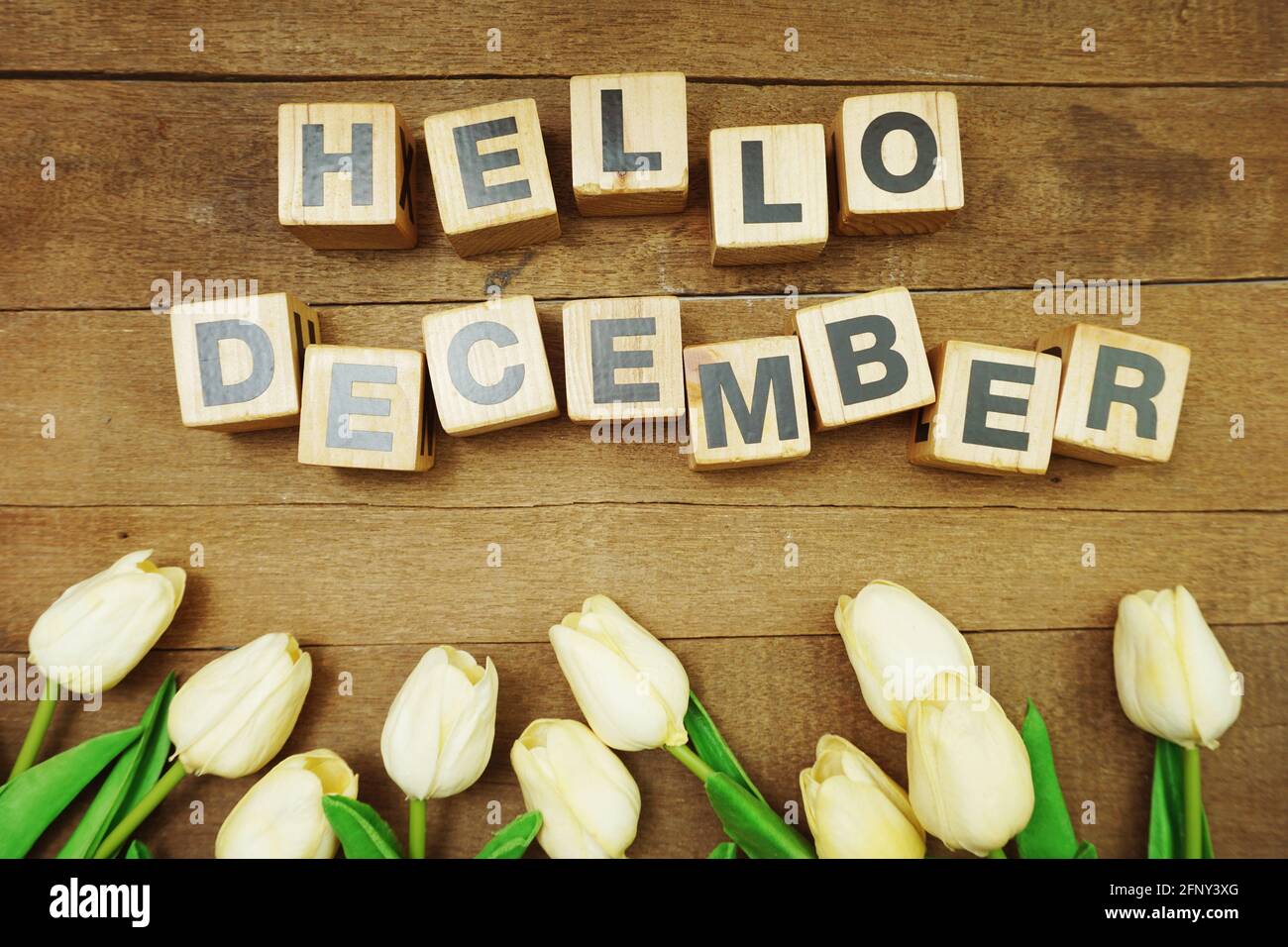 Hello December alphabet letters on wooden background Stock Photo - Alamy
