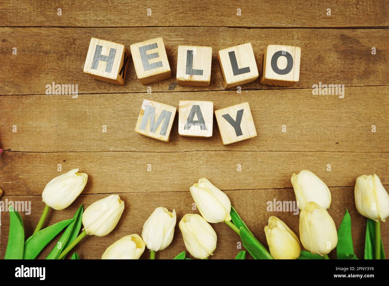 Hello May alphabet letters on wooden background Stock Photo - Alamy