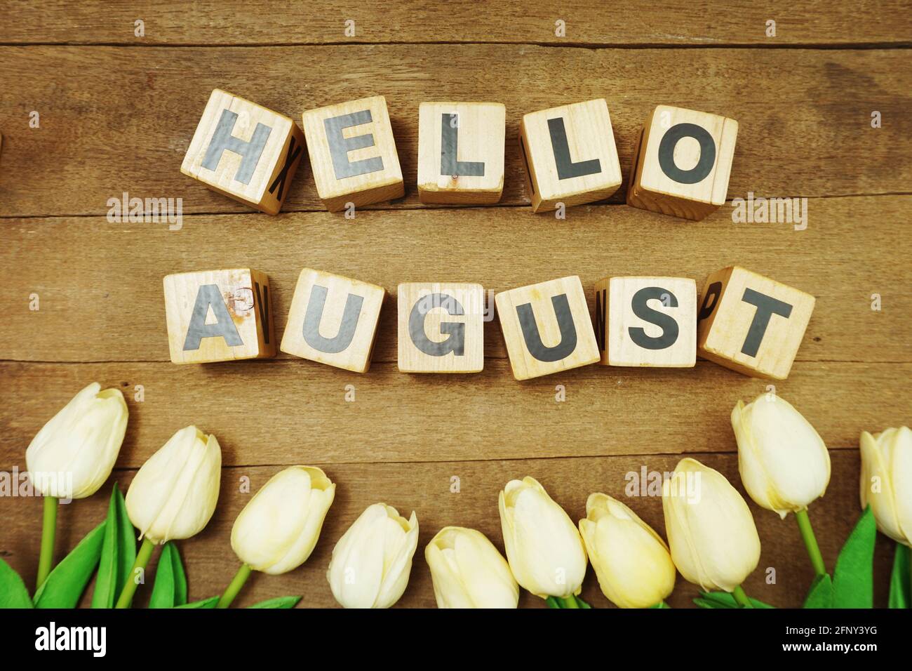 Hello August alphabet letters on wooden background Stock Photo - Alamy