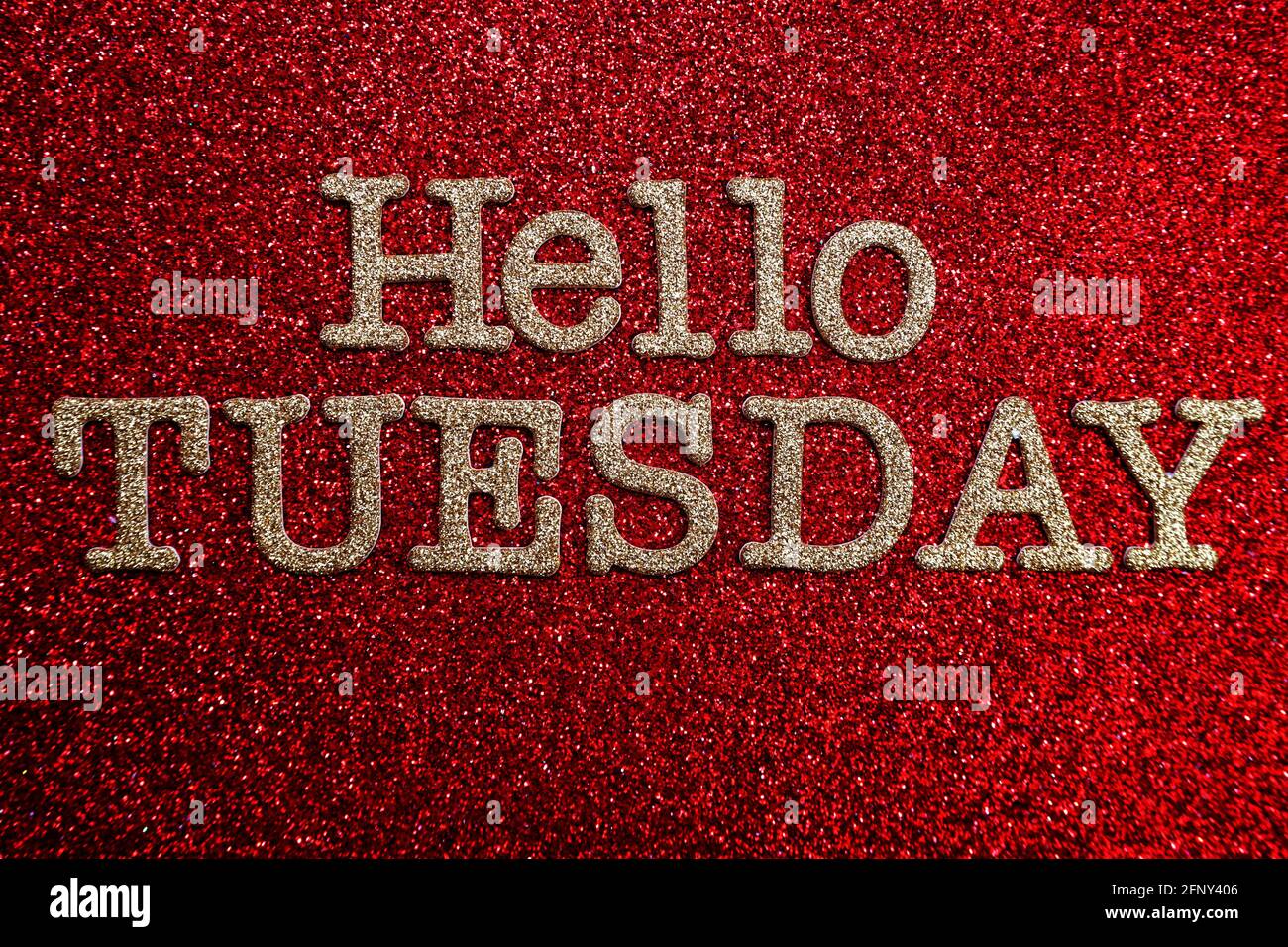 Hello Tuesday alphabet letter on red glitter background Stock Photo - Alamy
