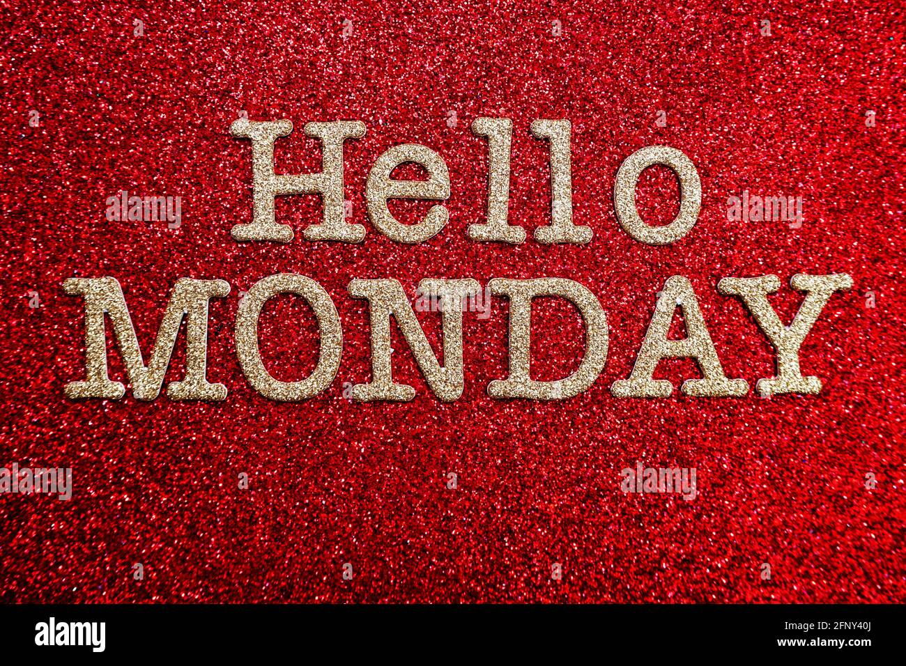 Hello Monday alphabet letter on red glitter background Stock Photo - Alamy