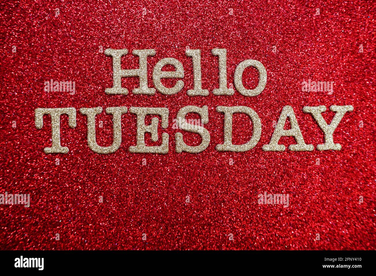 Hello Tuesday alphabet letter on red glitter background Stock Photo - Alamy
