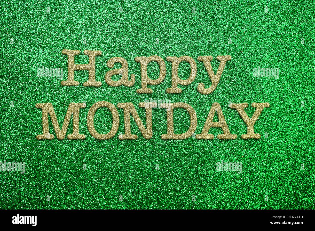 Happy Monday alphabet letter on green glitter background Stock Photo ...