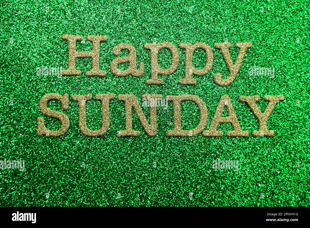 Happy Sunday alphabet letter on green glitter background Stock Photo ...