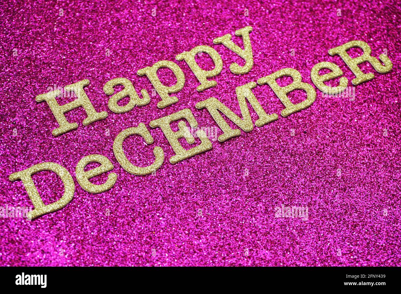 Happy December alphabet letters on pink glitter background Stock Photo ...