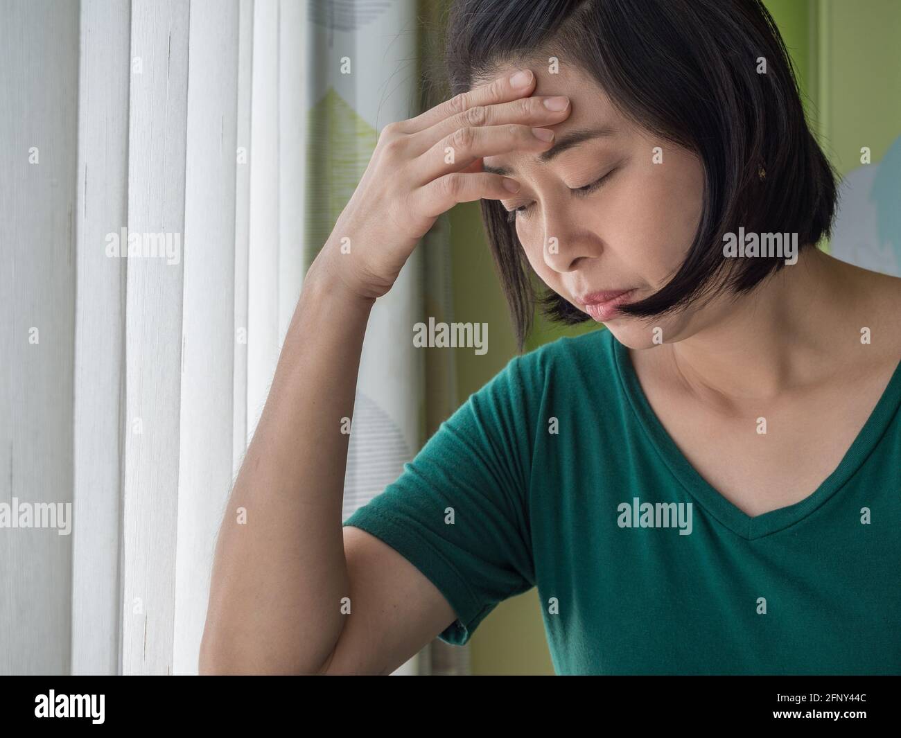 Asian thinking woman hi-res stock photography and images - Alamy