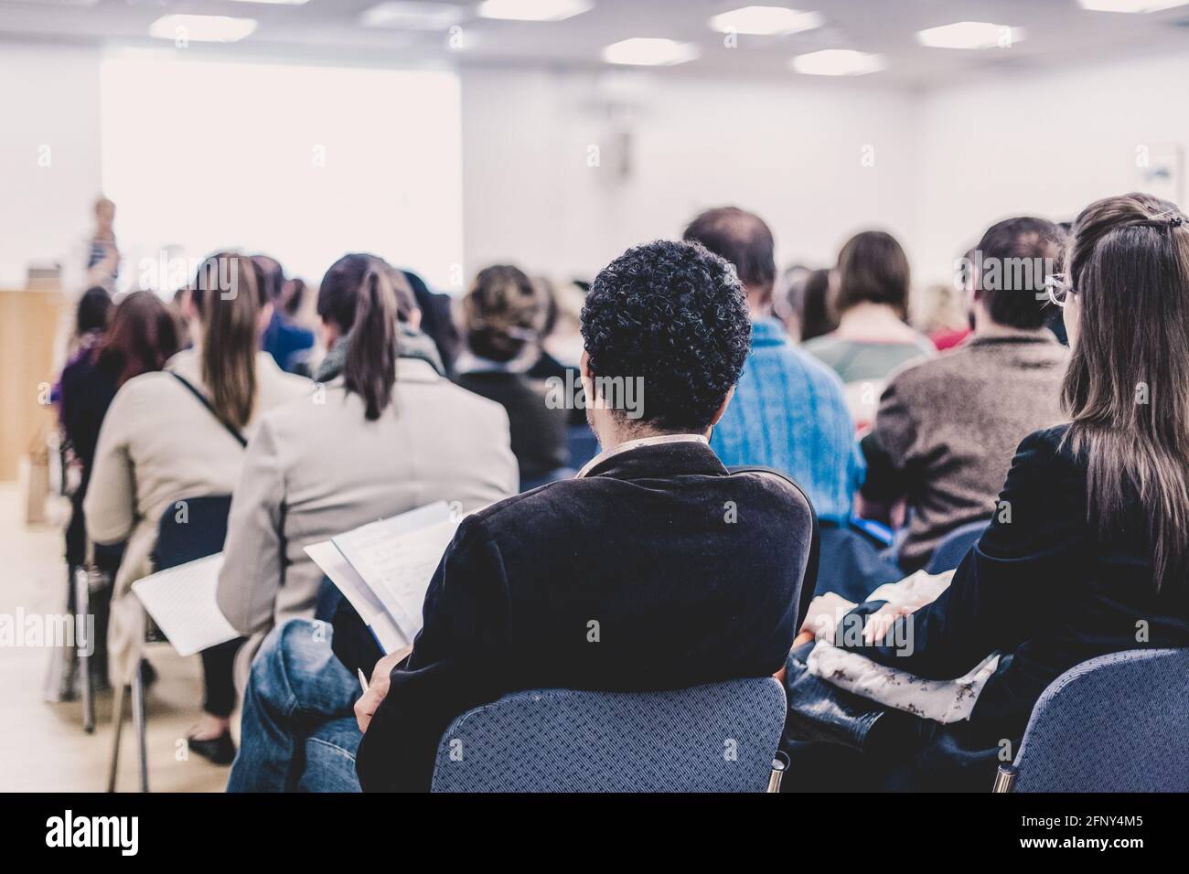 Woman giving academic presentation hi-res stock photography and images ...