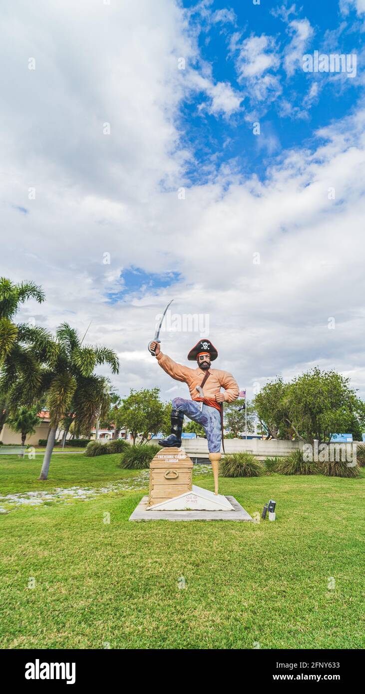 Pirate Statue standing on treasure chest with sword raised to the sky ...