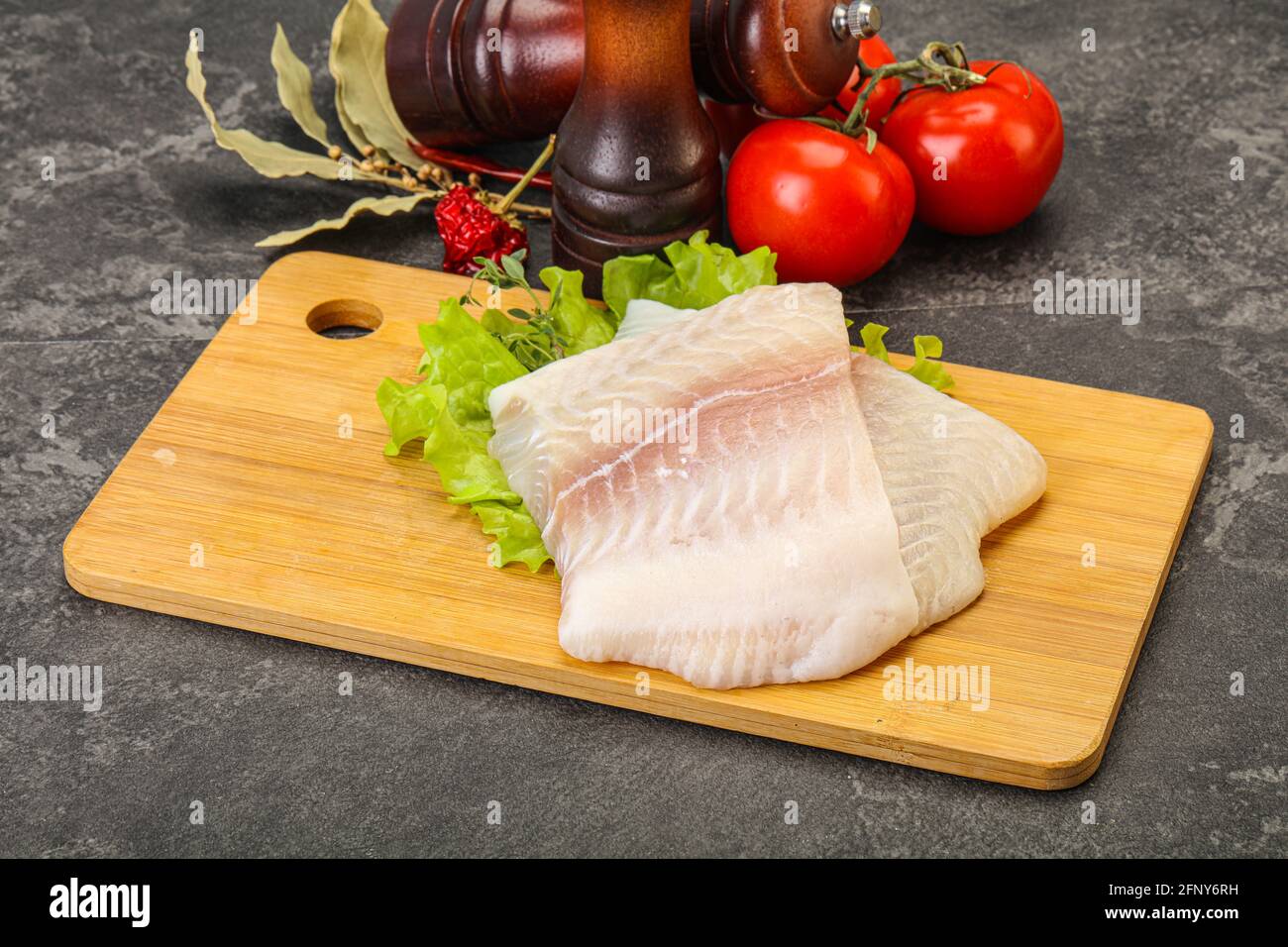 Raw pangasius fillet fish for cooking Stock Photo - Alamy