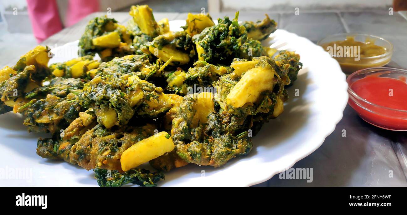 Spinach & potato Pakoras with sauce, An extremely delicious and mouth ...