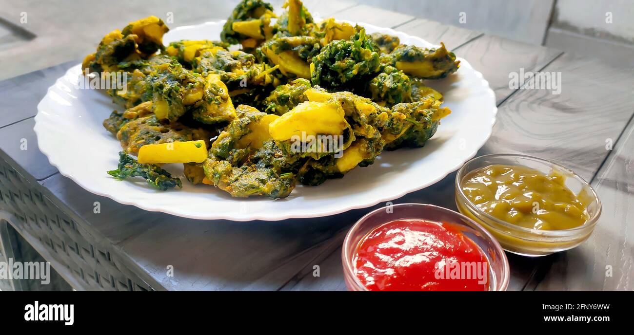 Spinach & potato Pakoras with sauce, An extremely delicious and mouth ...