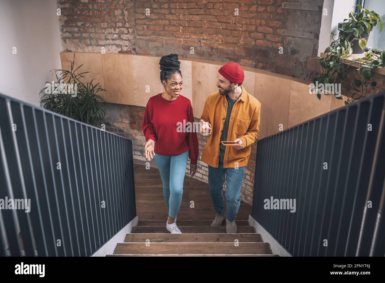 People going upstairs hi-res stock photography and images - Alamy