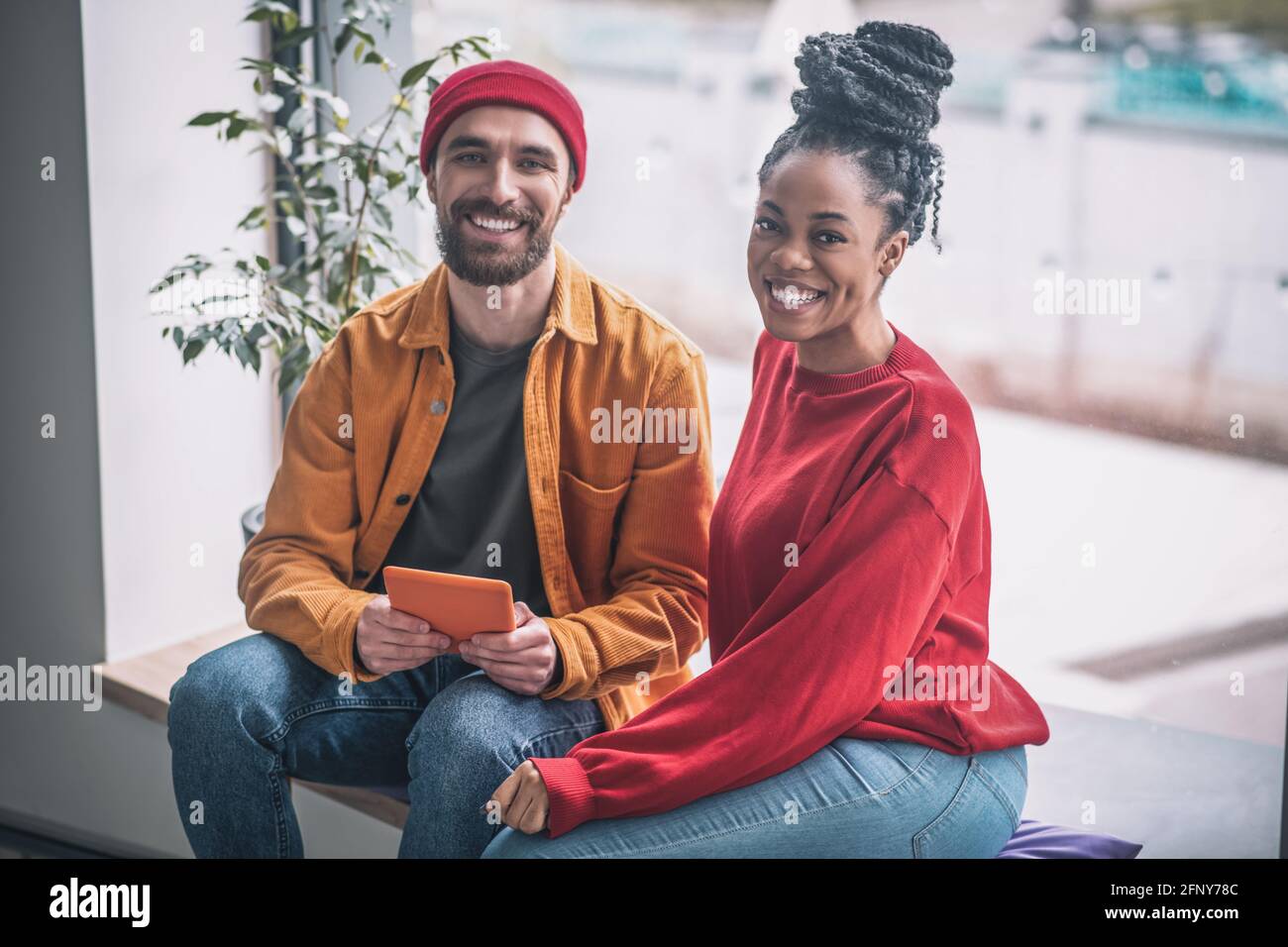 Black man talking colleagues on hi-res stock photography and images - Alamy