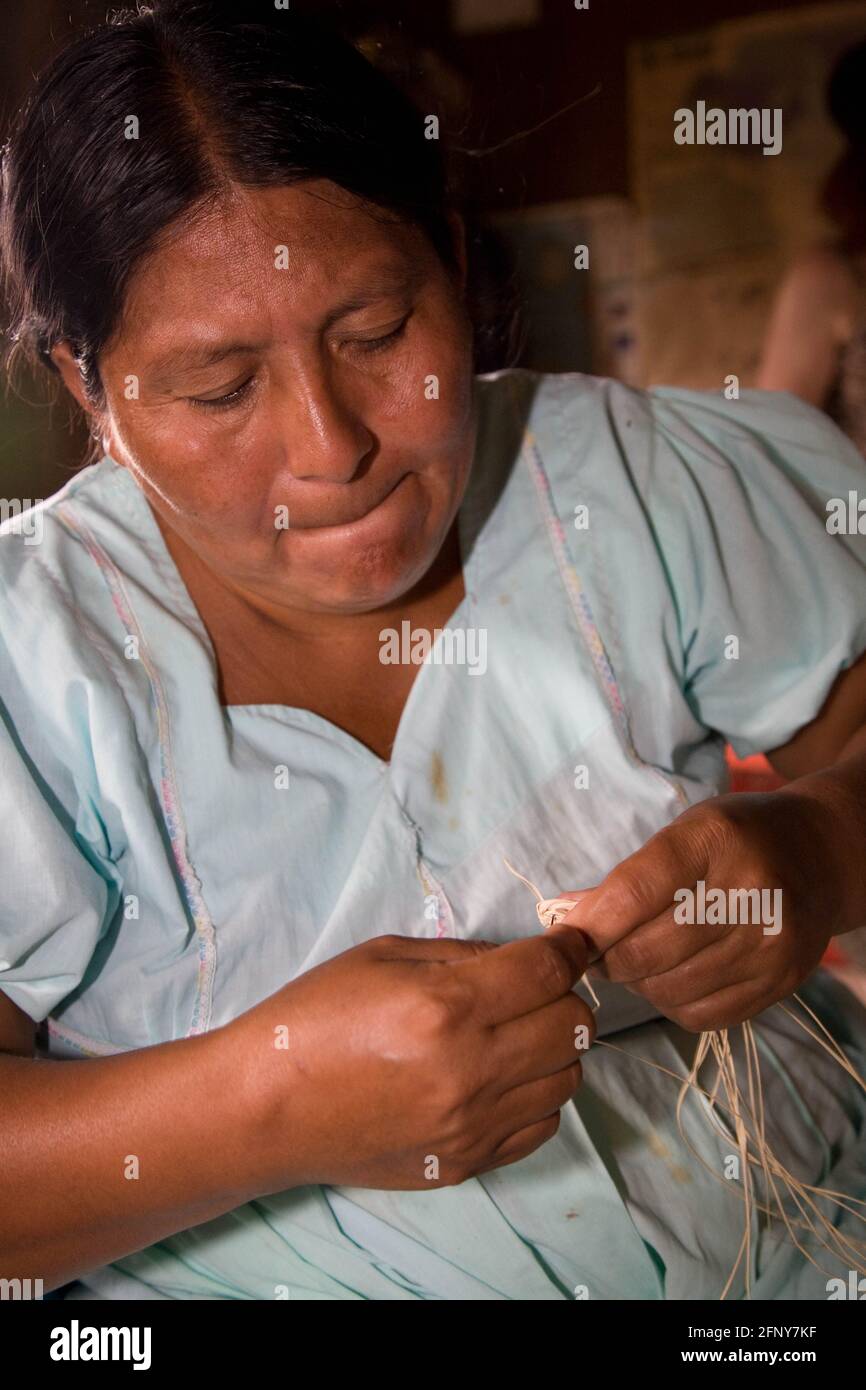 Mayan craftswoman Antonia Choco shows visitors how to weave traditional ...