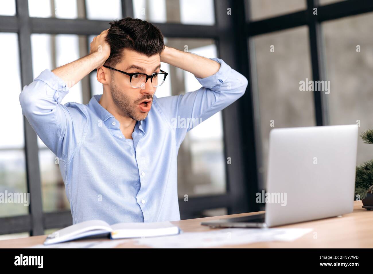 Shocked office worker hi-res stock photography and images - Alamy
