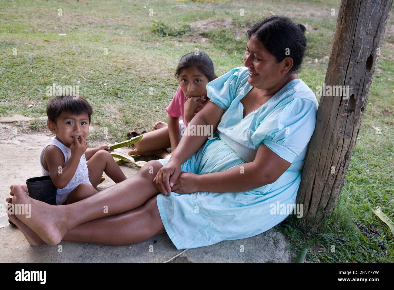 Mayan mother and children in the Mayan community of San Miguel, Toledo ...