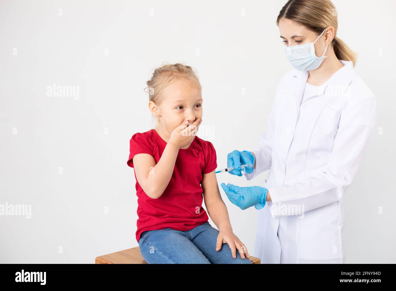 Kid scared doctor shot hi-res stock photography and images - Alamy