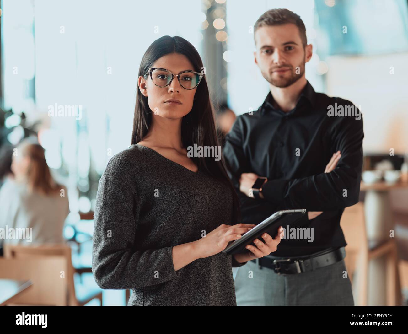 two businessmen posing decisively in the office Stock Photo - Alamy