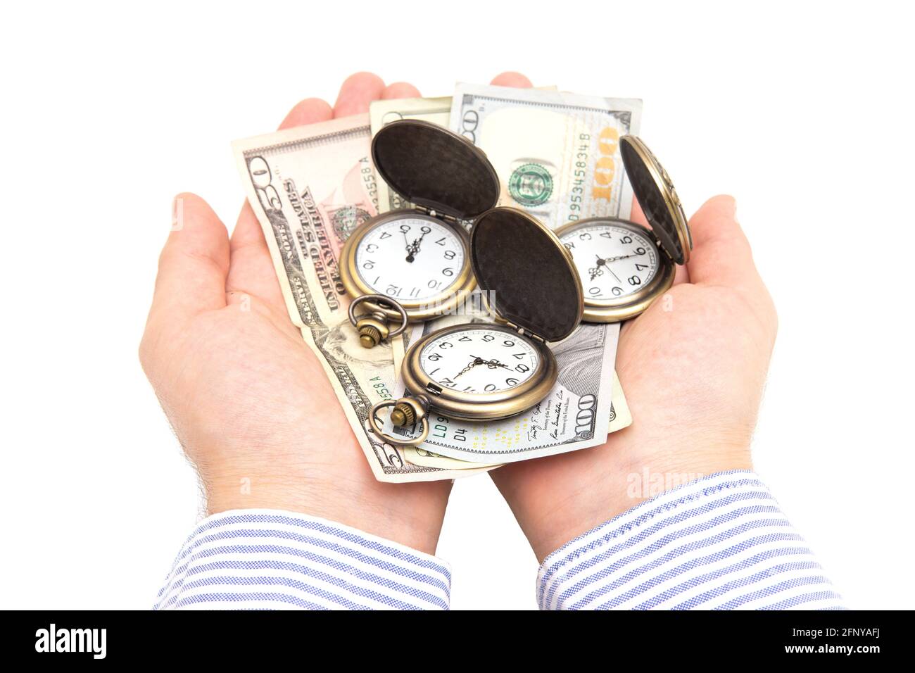 Male hands holding three antique pocket watches and dollar bills ...