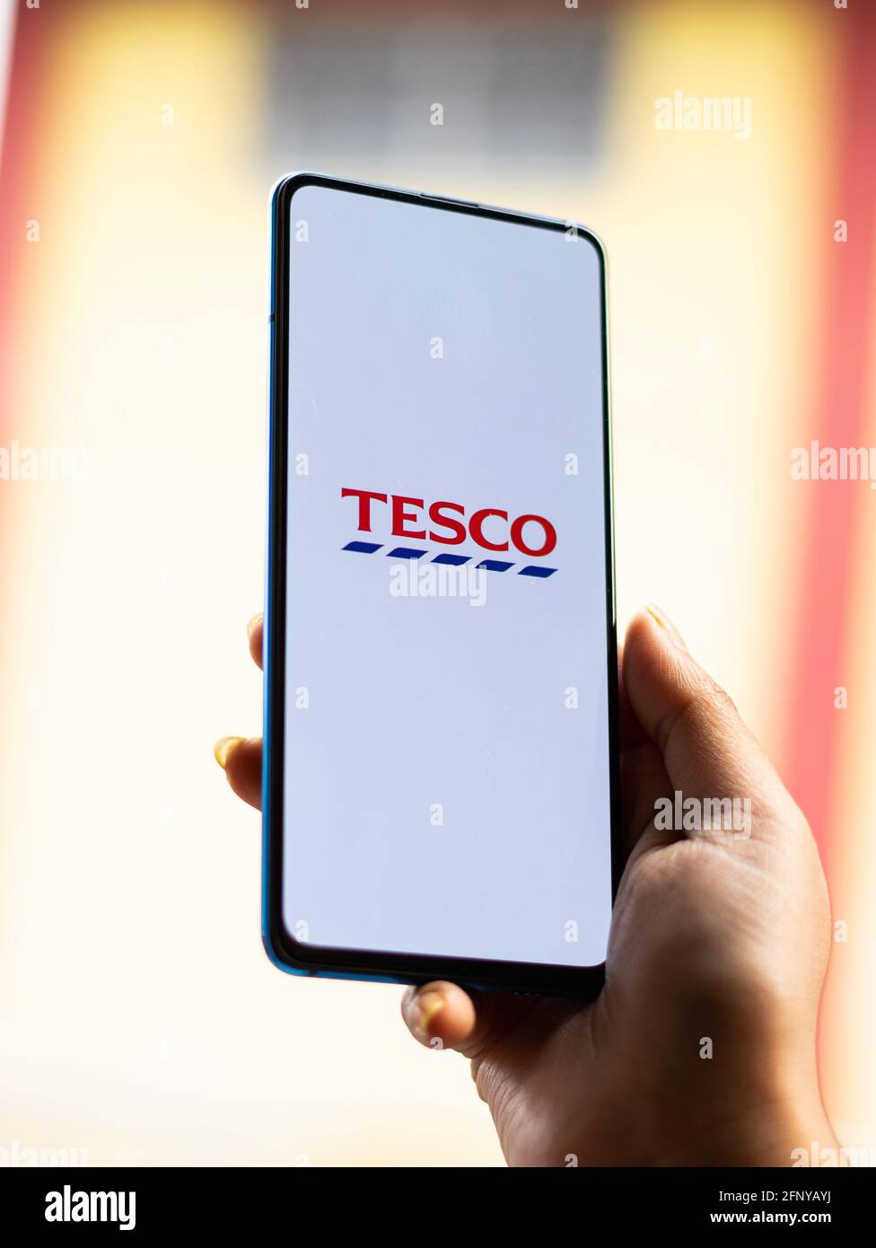 Assam, india - May 18, 2021 : Tesco logo on phone screen stock image ...