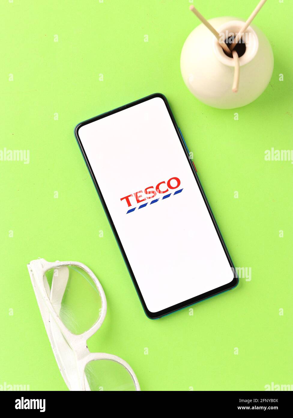 Assam, india - May 18, 2021 : Tesco logo on phone screen stock image ...