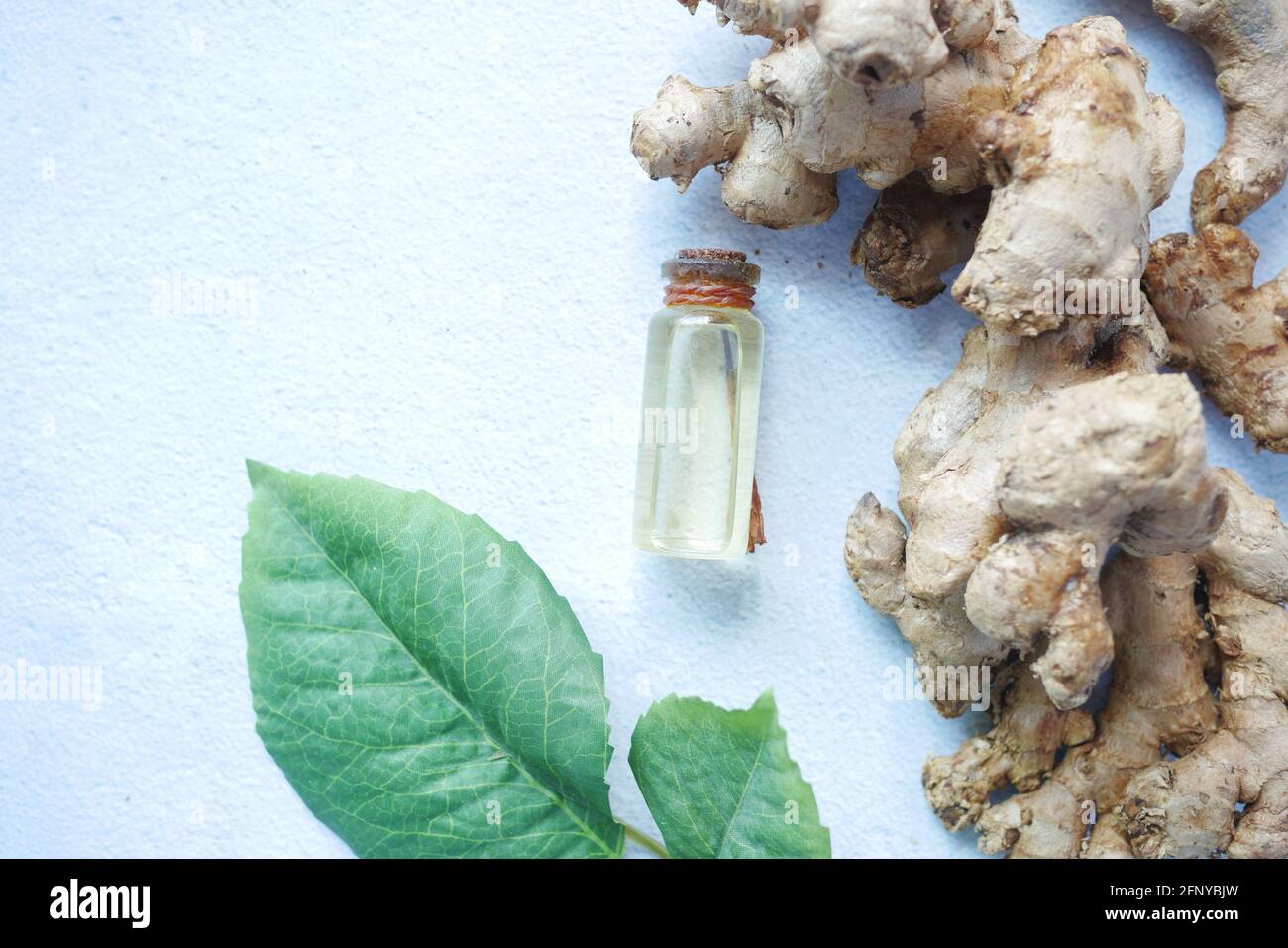 Ginger root vegetable oil hi-res stock photography and images - Alamy