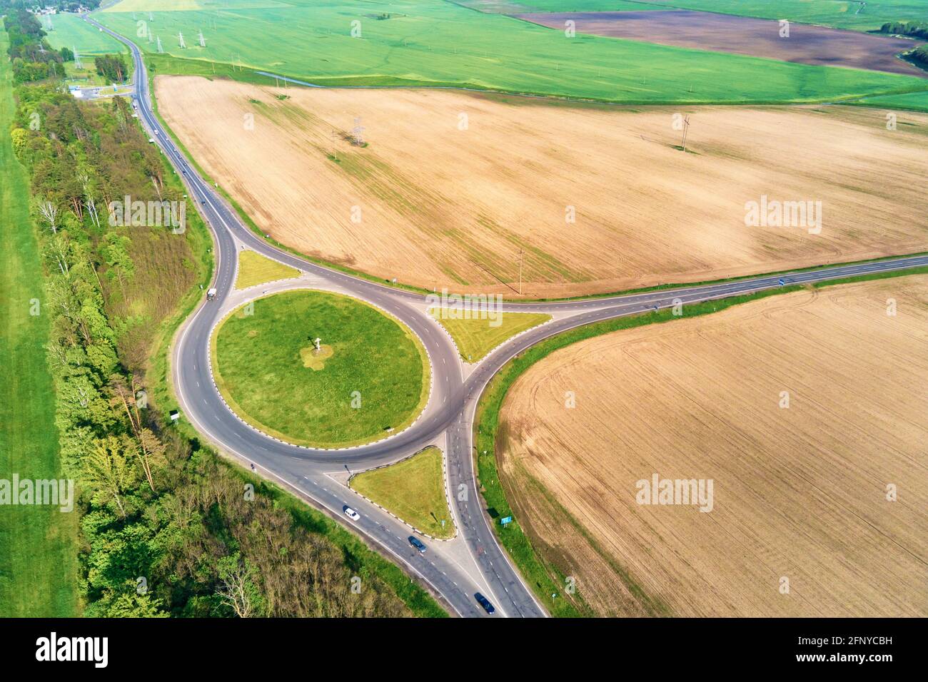 Circle crossroad among fields in countryside, aerial view ...