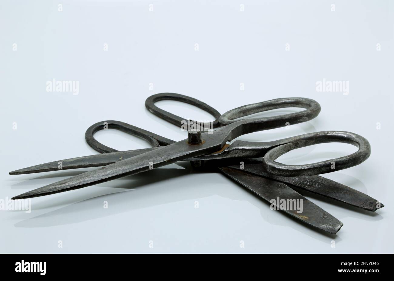 Old blacksmith forged scissors isolated on white background Stock Photo ...