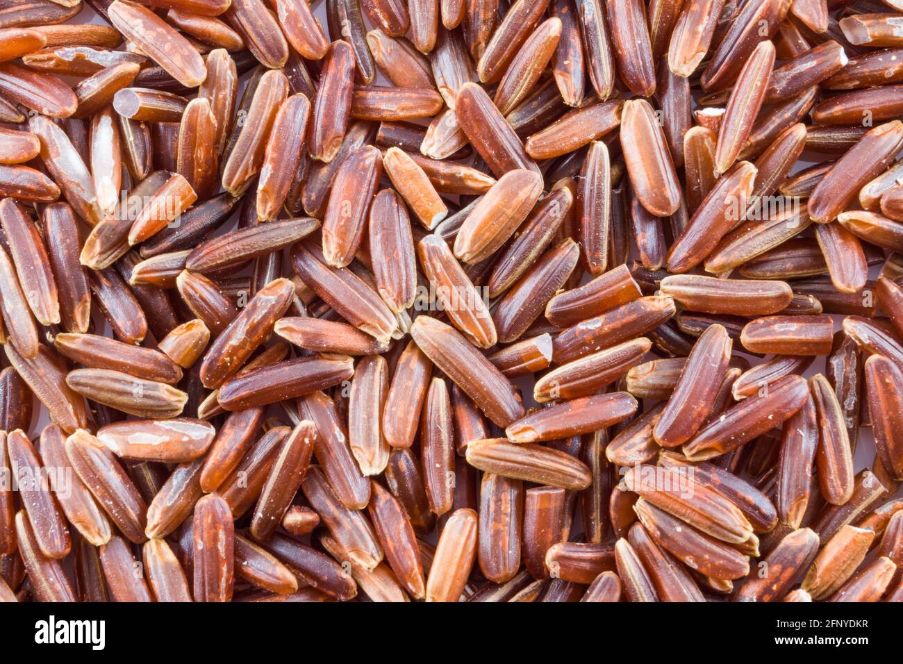 Macro / Close up brown rice background Stock Photo - Alamy