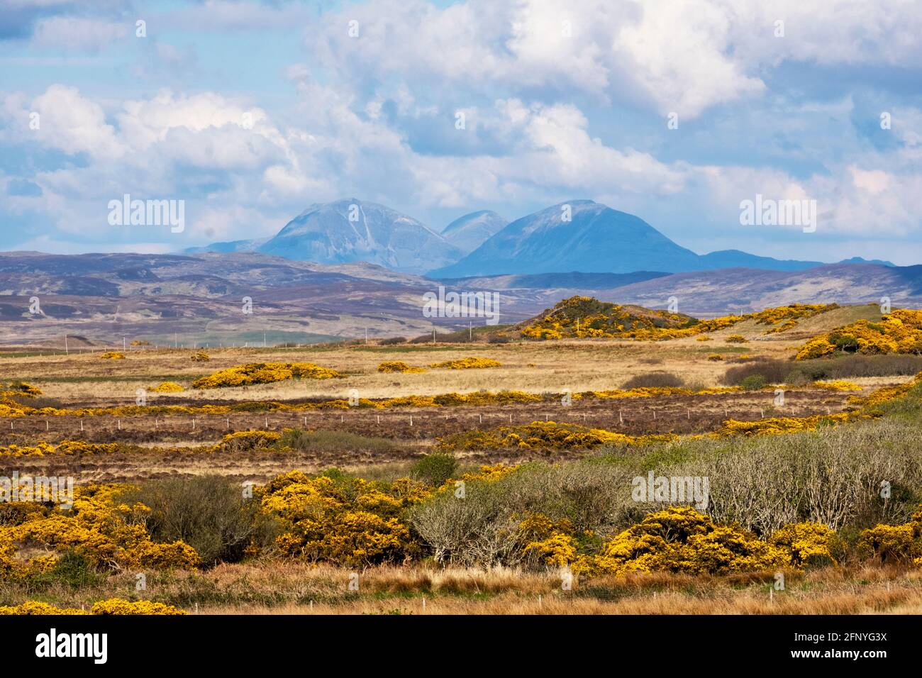 A view from Islay of the Paps of Jura mountains on the Isle of Jura ...