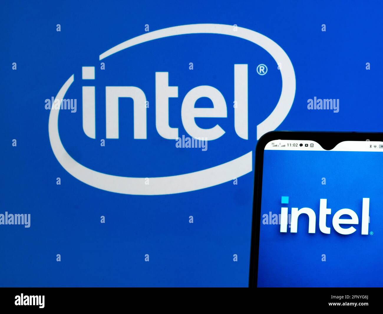 In this photo illustration Intel Corporation logo seen displayed on a ...