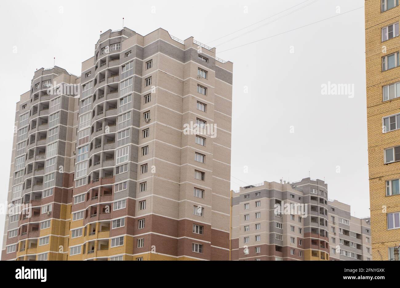 Multi-storey high-rise building in a new area of the city. Modern new ...