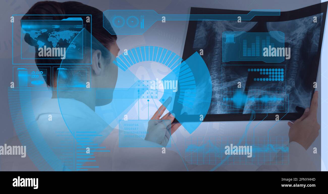 Digital interface with data processing over female doctor examining x ...