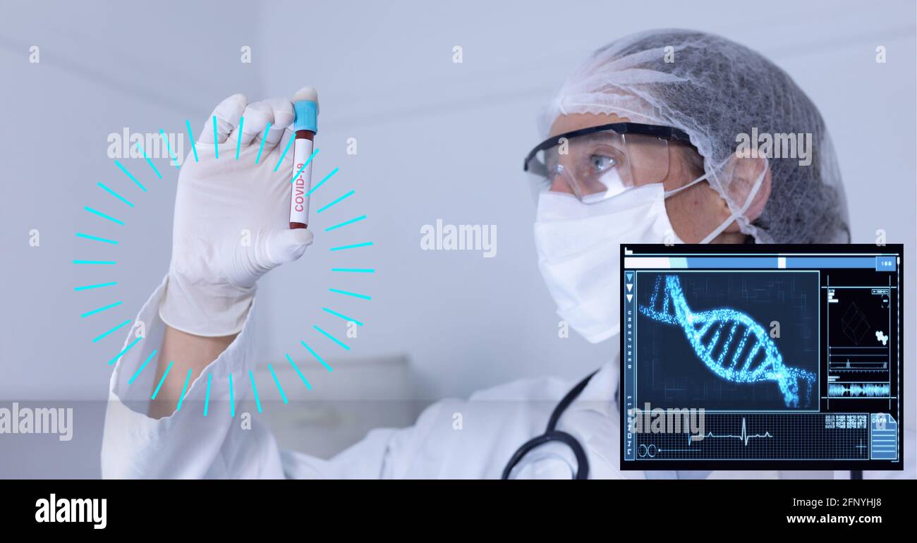 Composition of scope, screen with dna over doctor in ppe suit holding ...