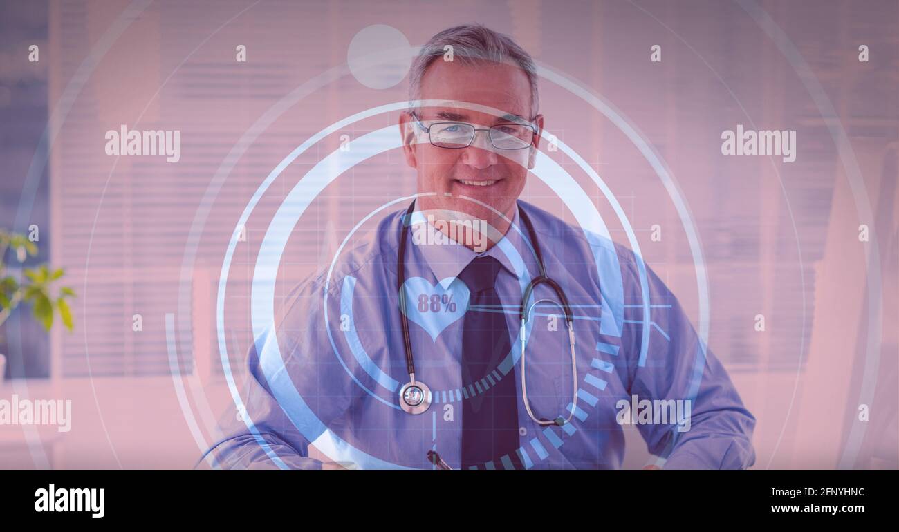 Heart rate monitor against portrait of caucasian senior male doctor ...