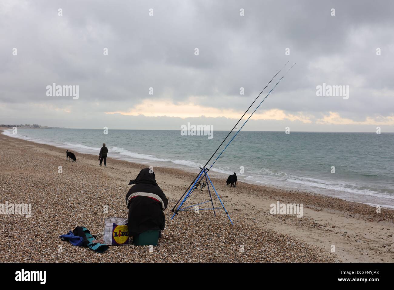 Fishing on the beach, UK Stock Photo - Alamy