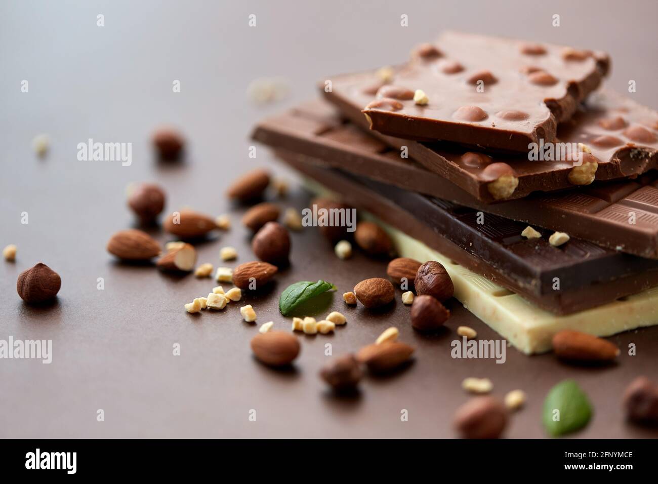 close up of different chocolate bars and nuts Stock Photo - Alamy